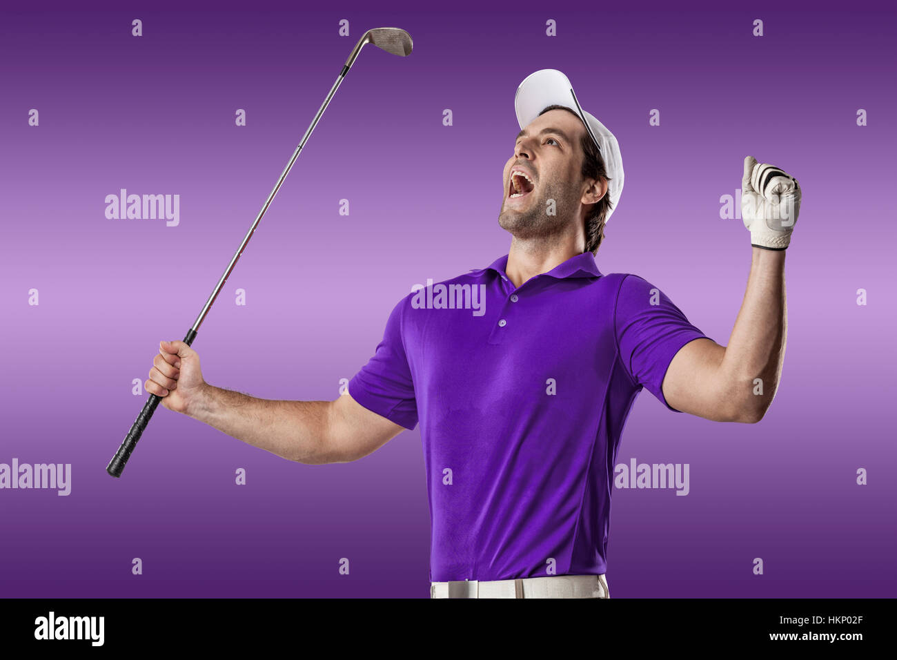 Golf Player in a purple shirt celebrating, on a purple Background Stock ...