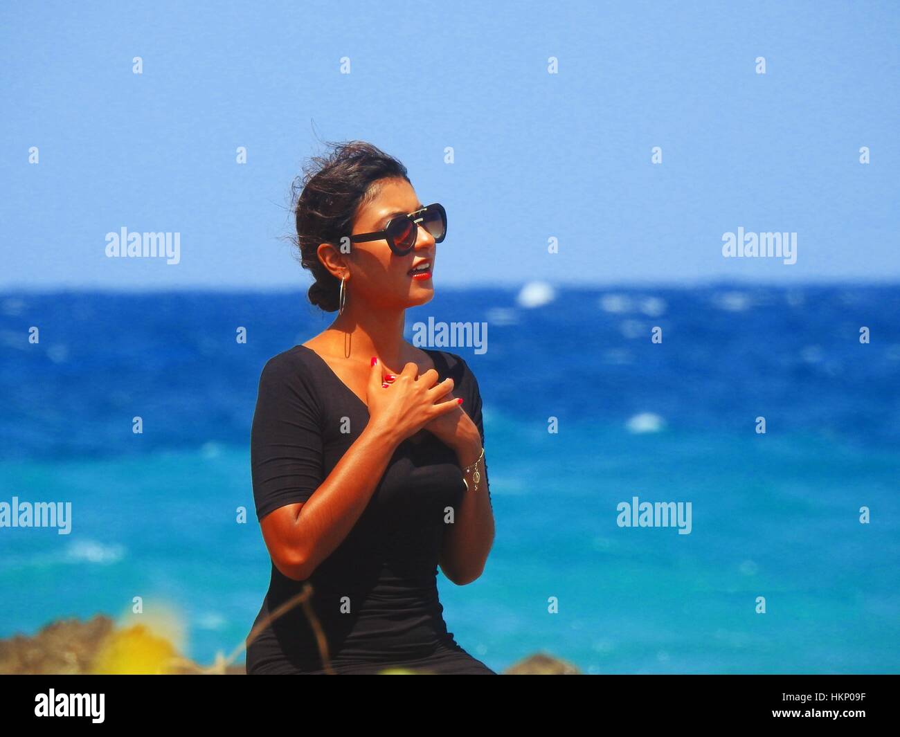 Happy Woman At Ocean Stock Photo - Alamy