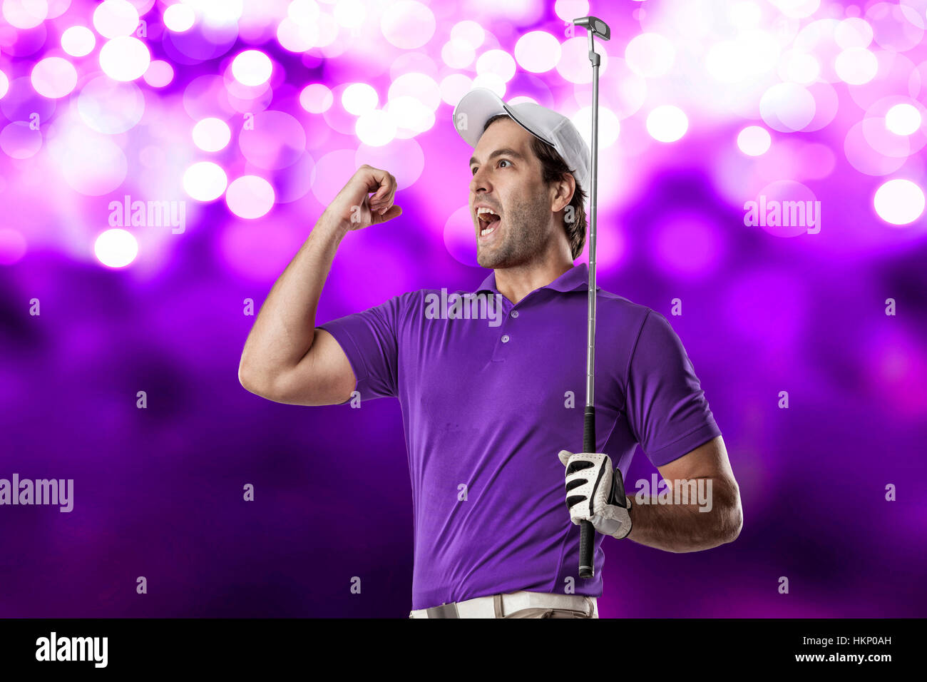 Golf Player in a purple shirt celebrating, on a purple lights ...