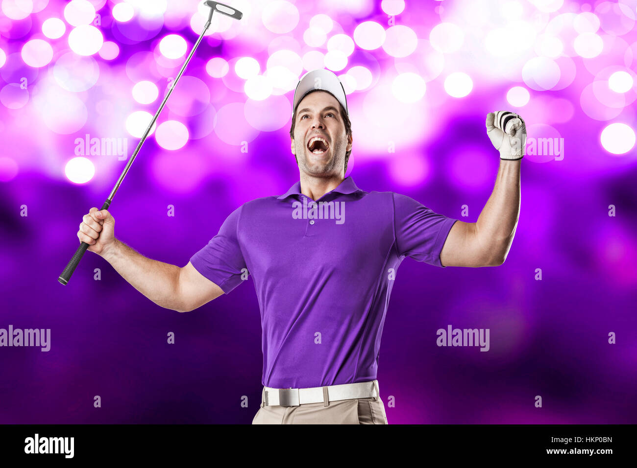 Golf Player in a purple shirt celebrating, on a purple lights ...