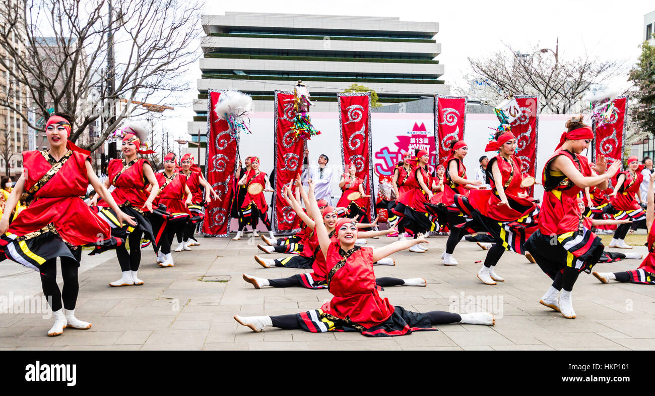Japanese Yosakoi dance festival. Young women team, in black and red ...