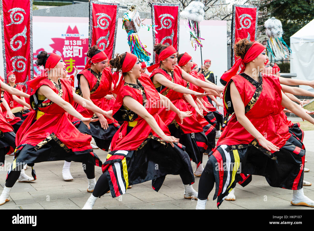 Japanese Yosakoi dance festival. Young women team, in black and red ...