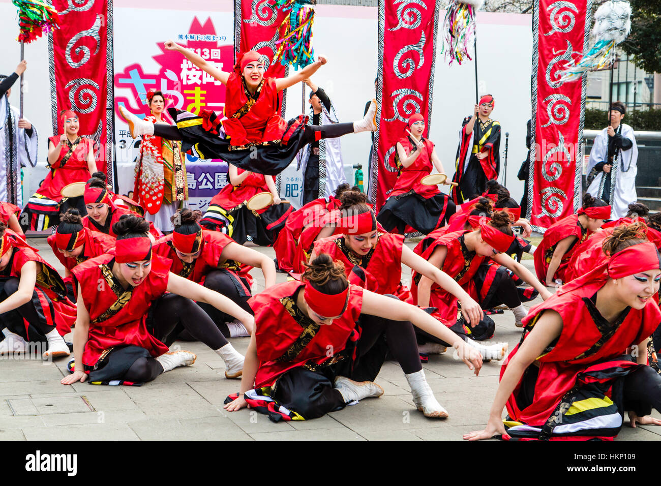 Japanese Yosakoi dance festival. Young women team, in black and red ...