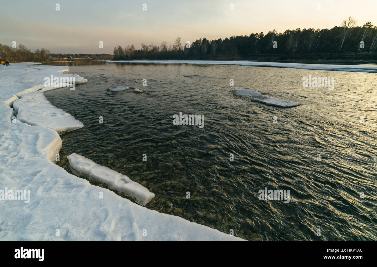 Winter sunset in river Stock Photo - Alamy