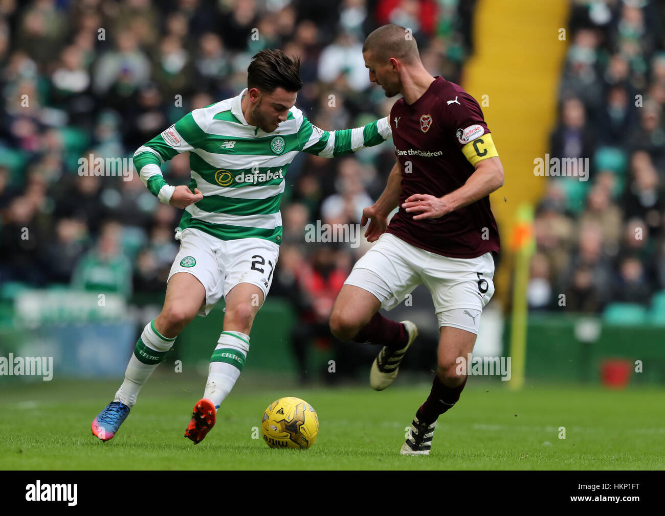 Celtic's Patrick Roberts (left) and Hearts Perry Kitchen battle for the ...
