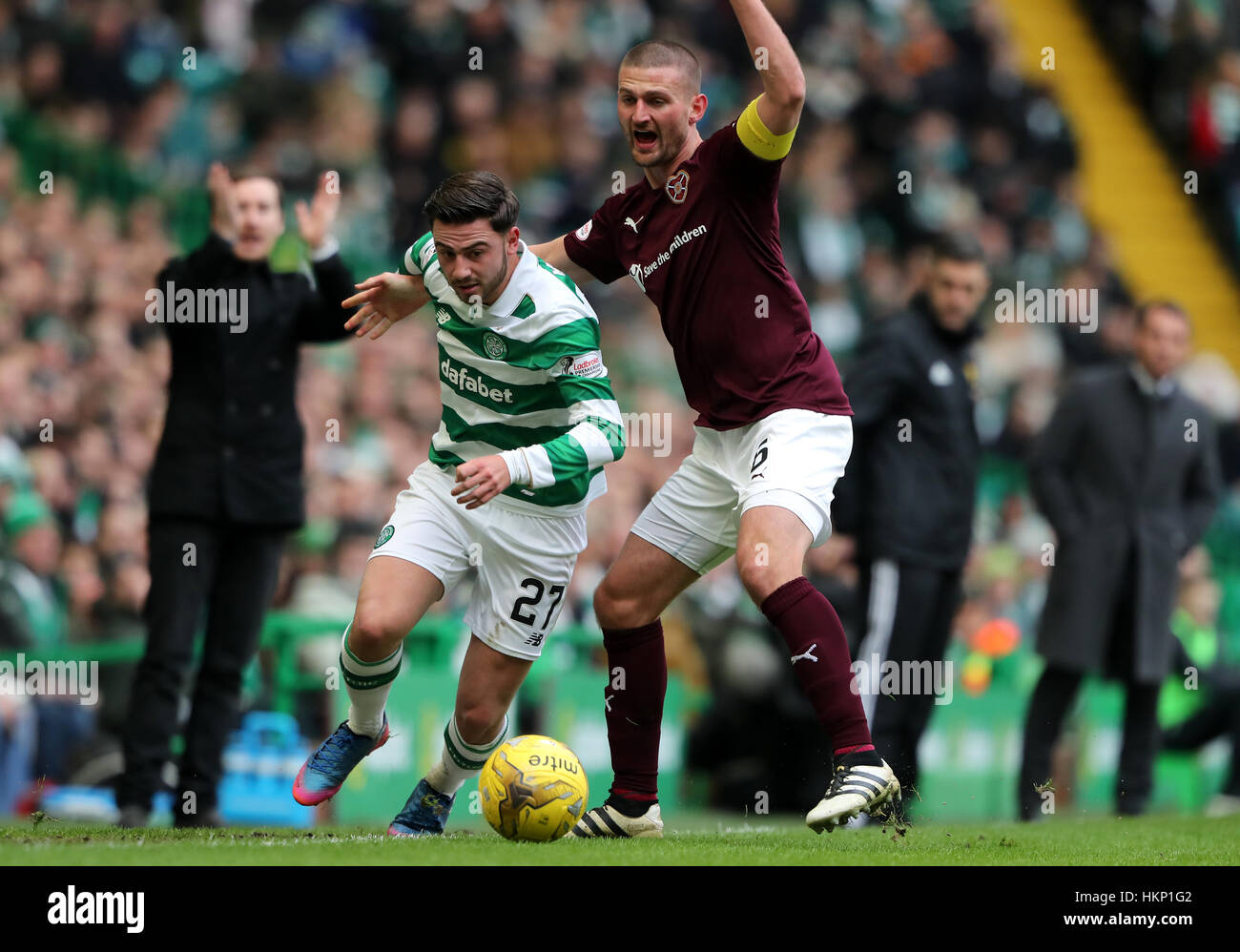 Celtic's Patrick Roberts (left) and Hearts Perry Kitchen battle for the ...