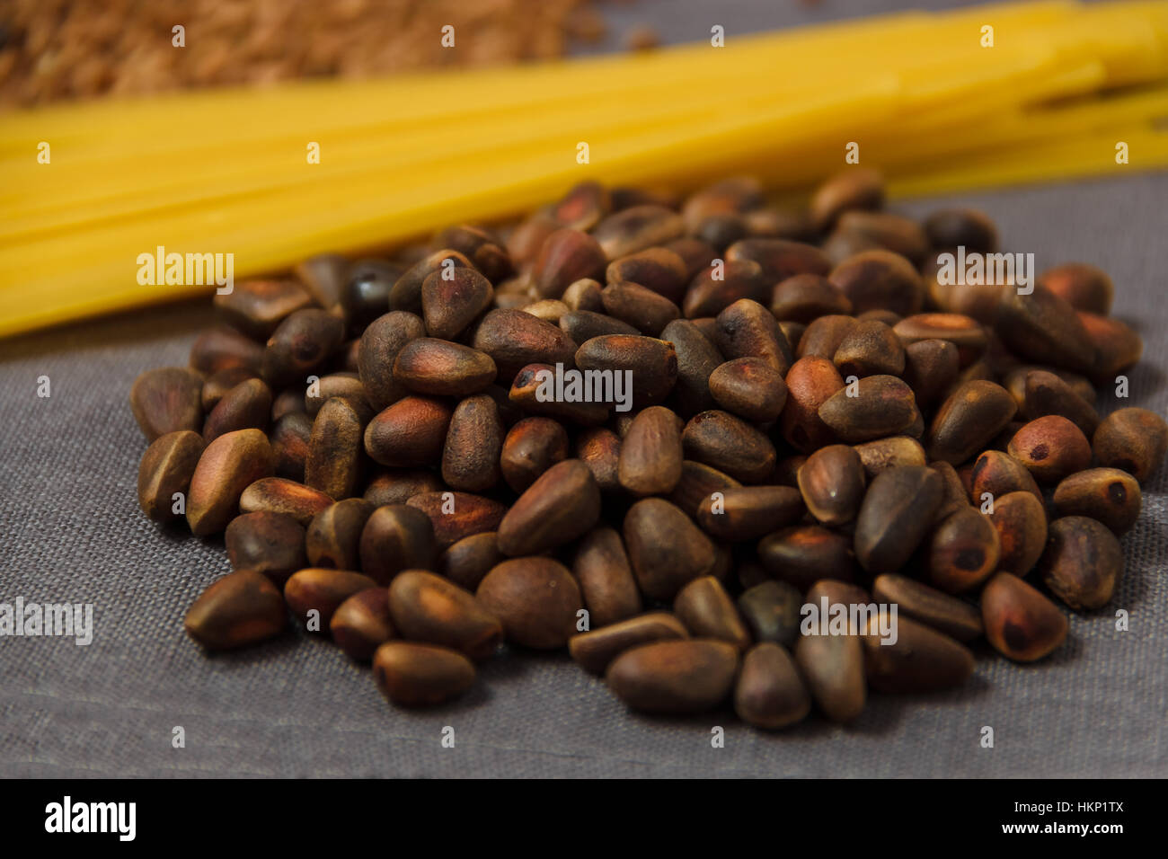 Pine nuts in shell Food background Stock Photo - Alamy