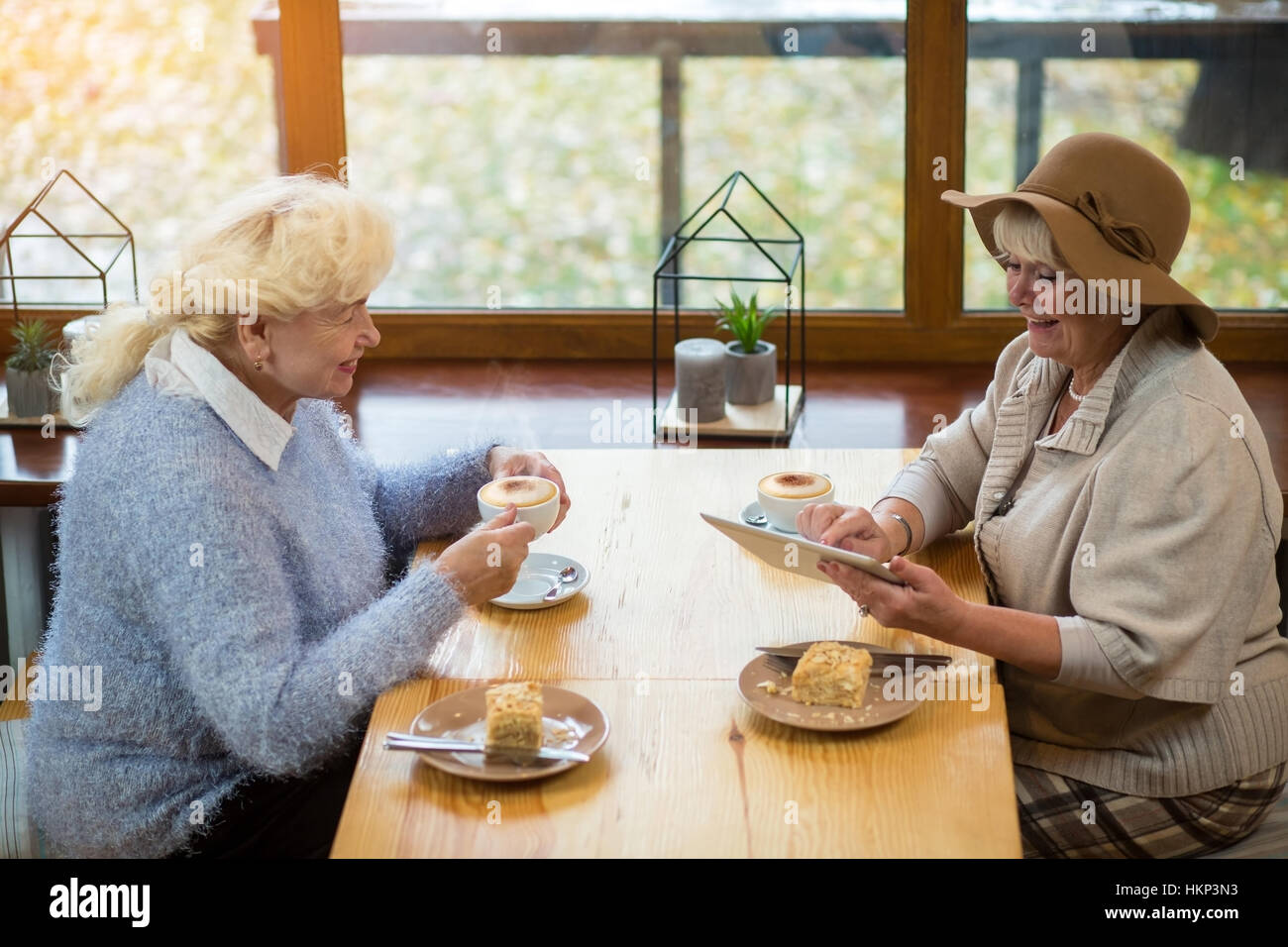 Senior women tablet hi-res stock photography and images - Alamy