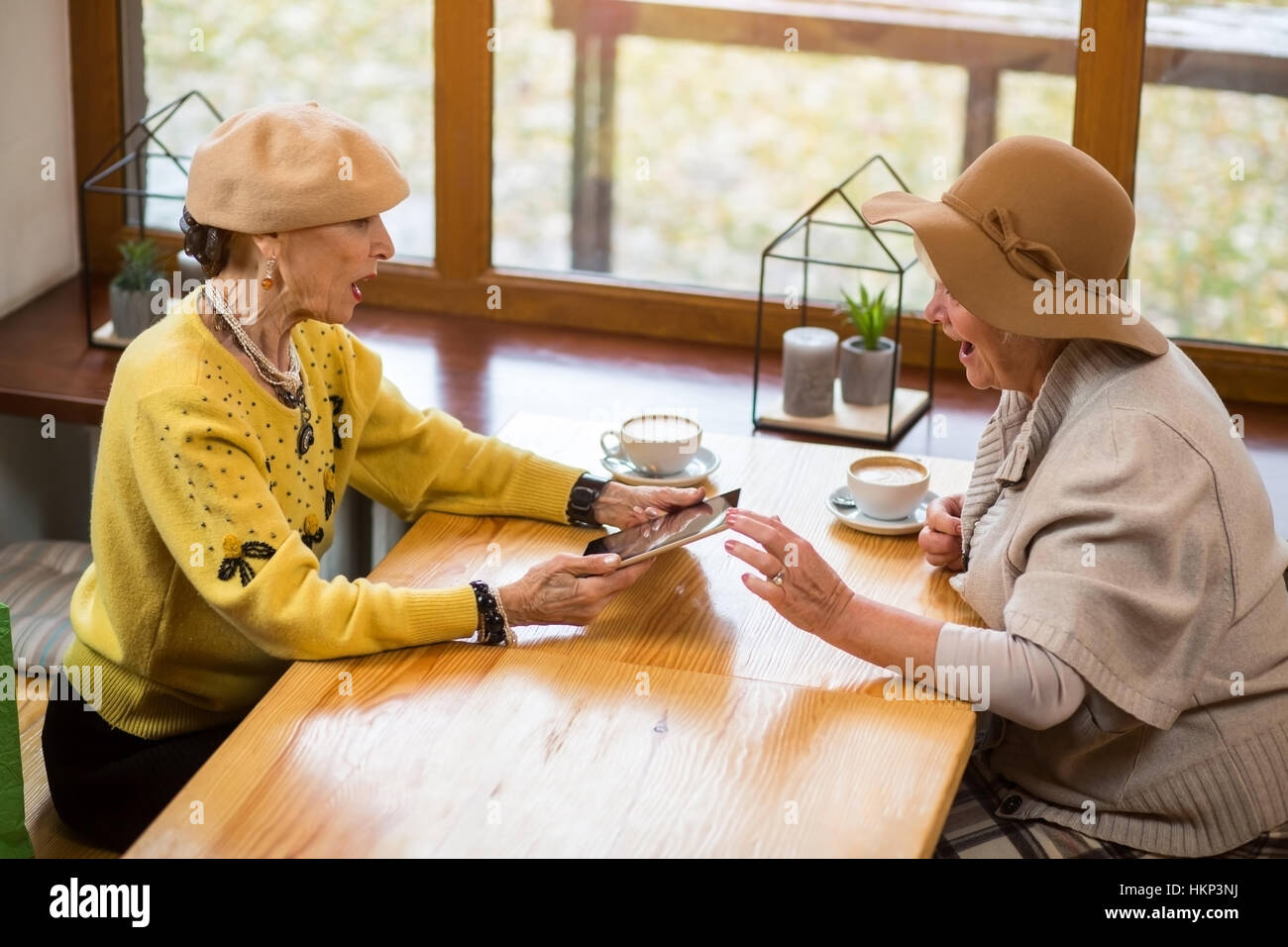 Senior women and a tablet Stock Photo - Alamy
