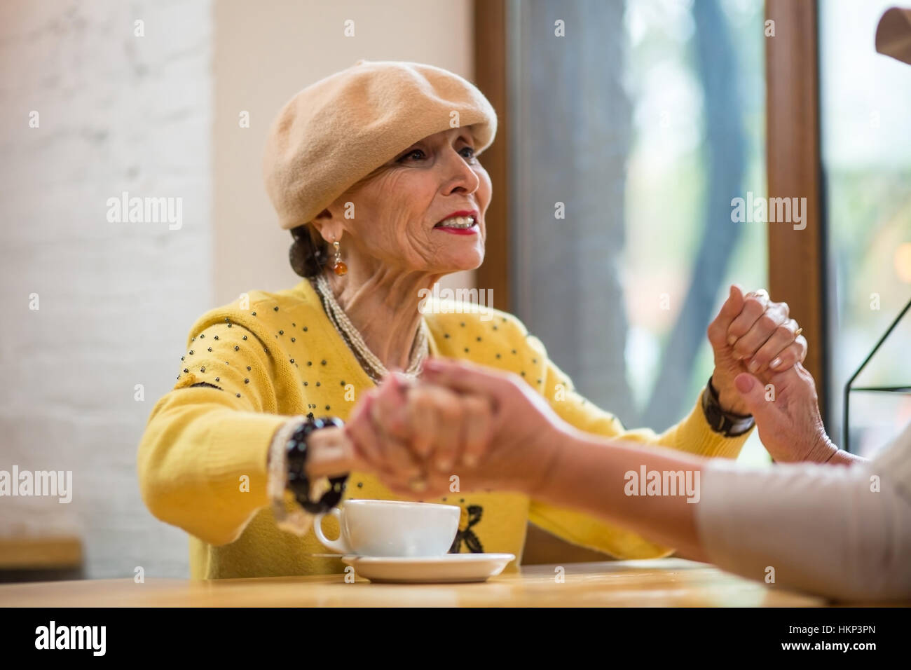 Women hold hand hi-res stock photography and images - Alamy