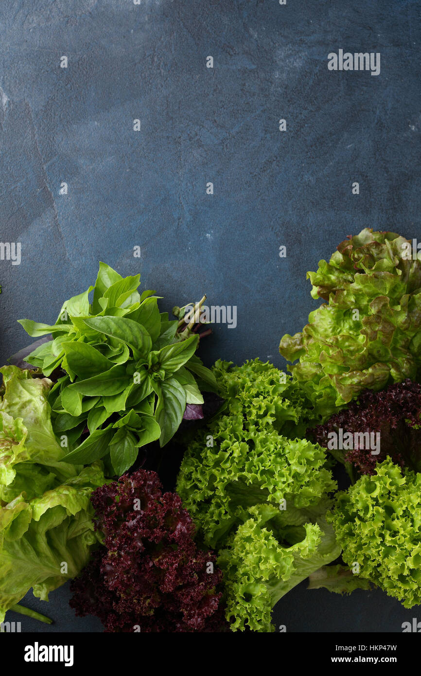 Blue food background with lettuce, top view Stock Photo - Alamy