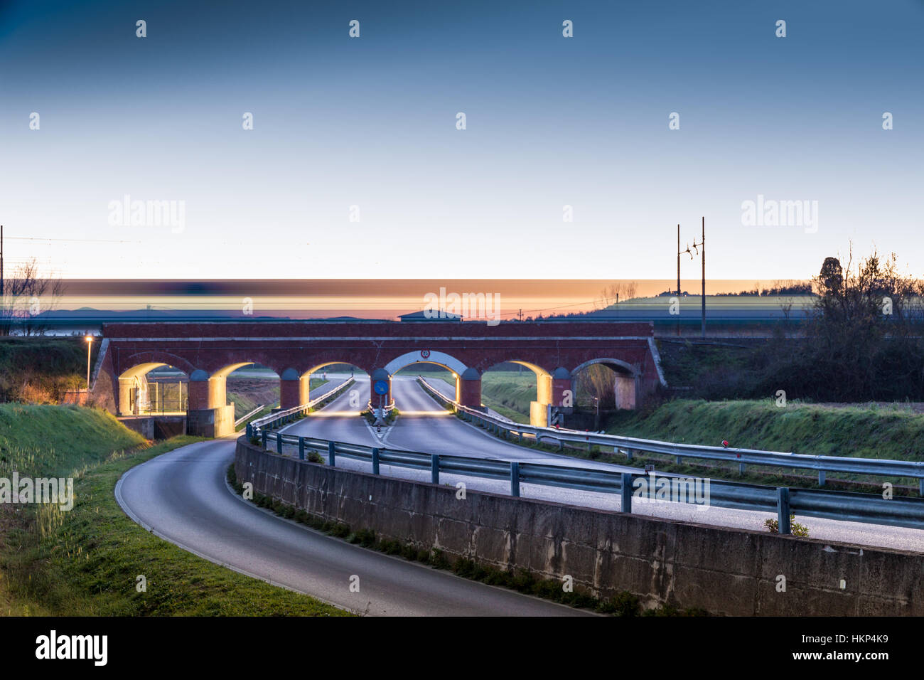 Railway bridge over road in Tuscany, Italy Stock Photo - Alamy