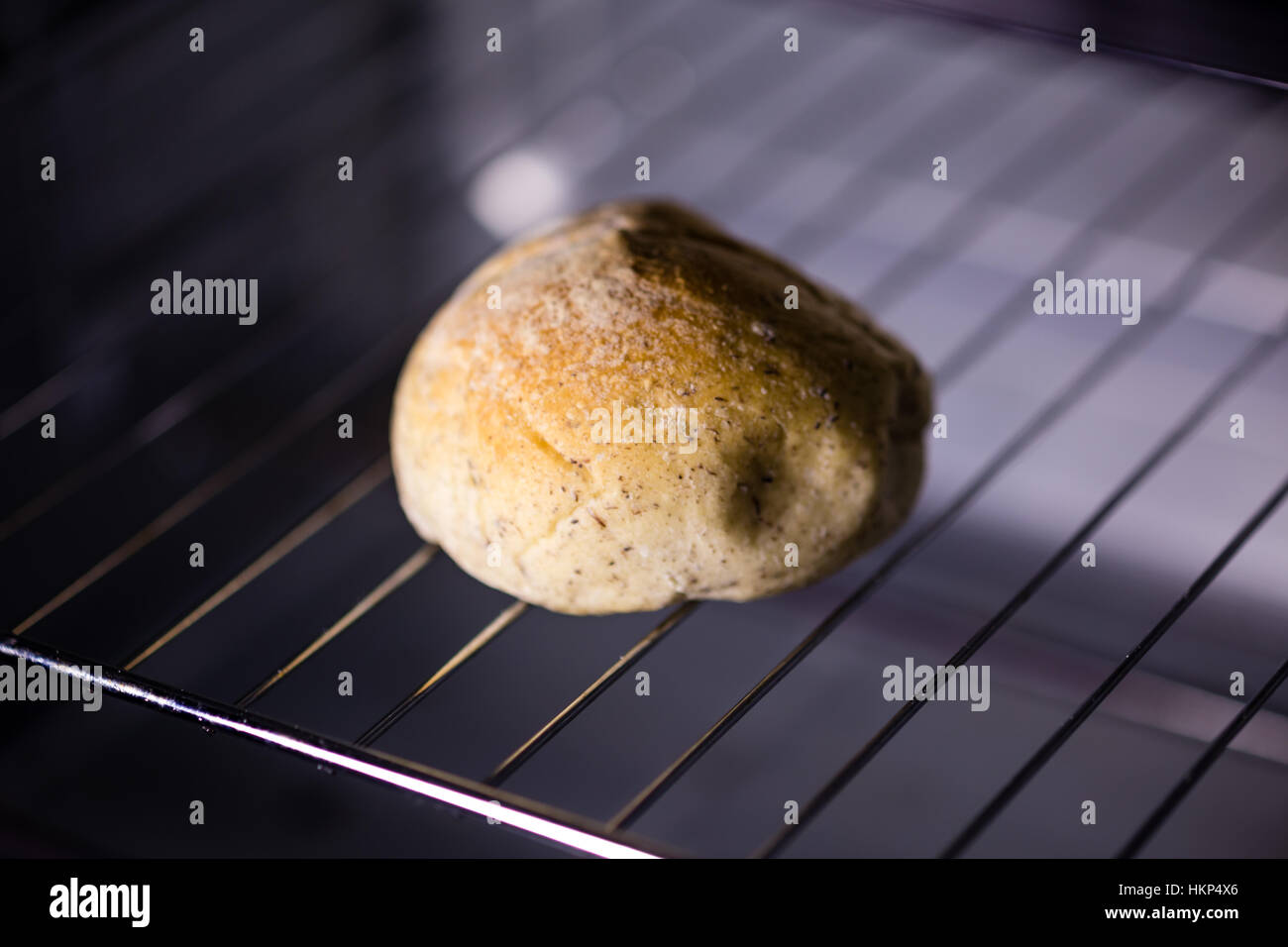 One bun in oven, shallow DOF Stock Photo - Alamy