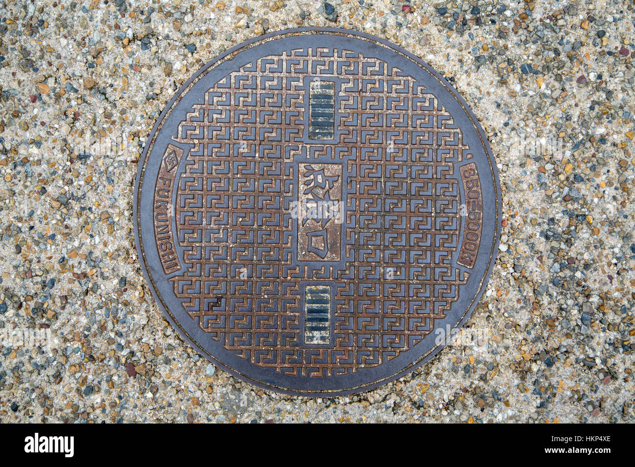 Circle steel manhole cover or metal sewer on the street in Japan Stock ...