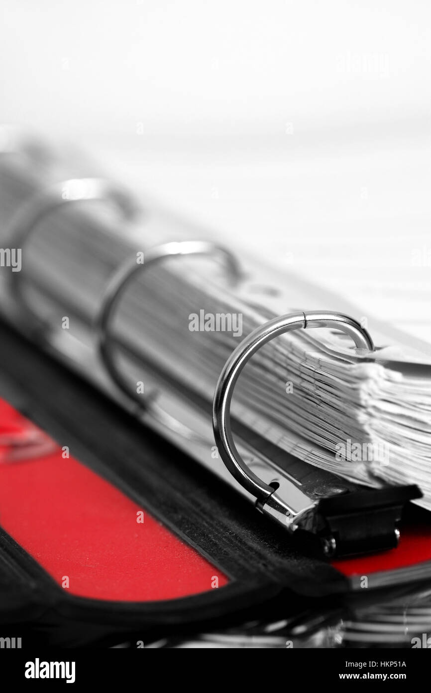 Binder folder with paperwork on a steel surface Stock Photo - Alamy