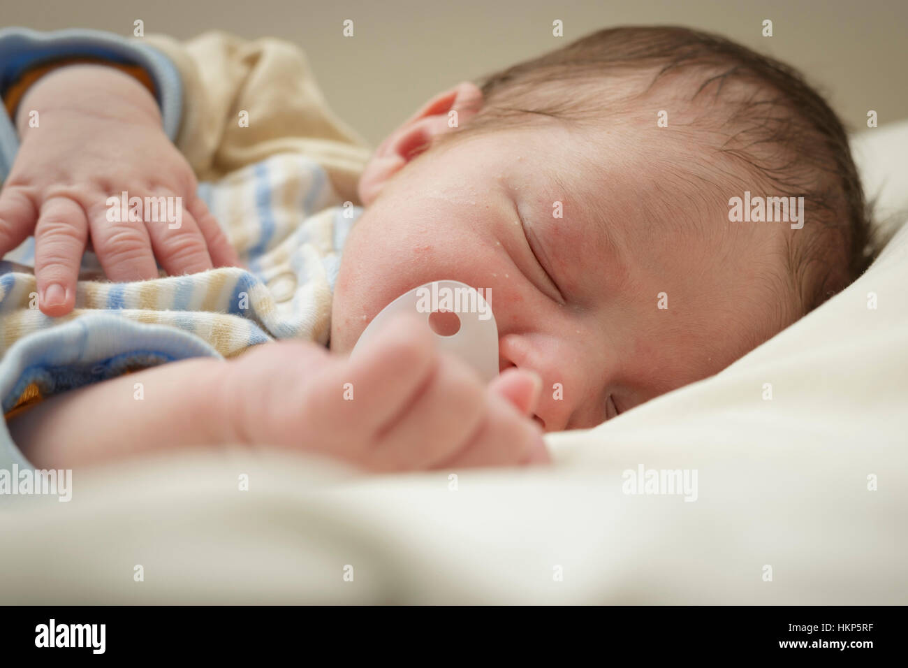 sleeping baby with a pacifier Stock Photo - Alamy