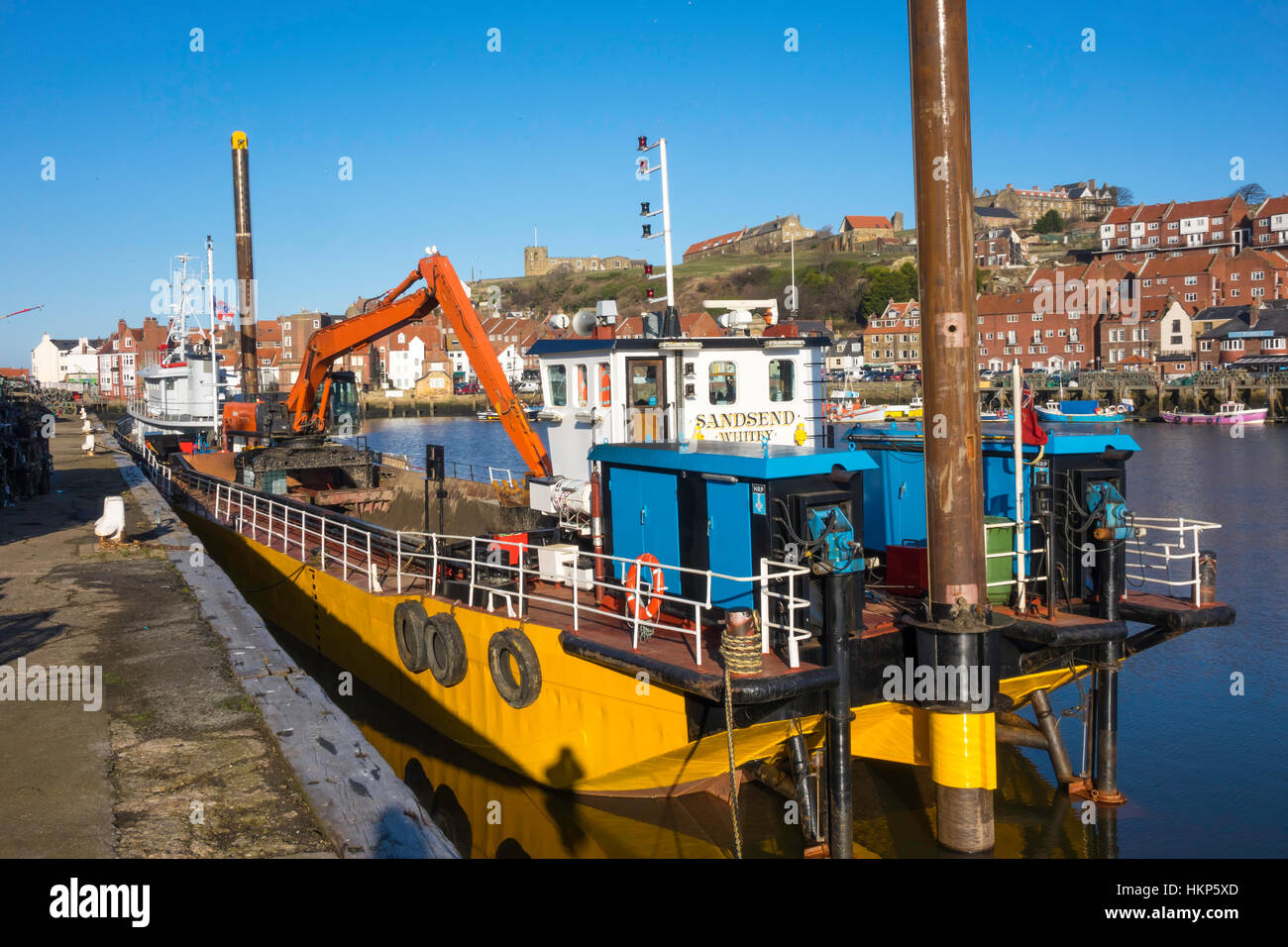 Excavation port maintenance dredger "Sandsend" in Whitby harbour Stock ...