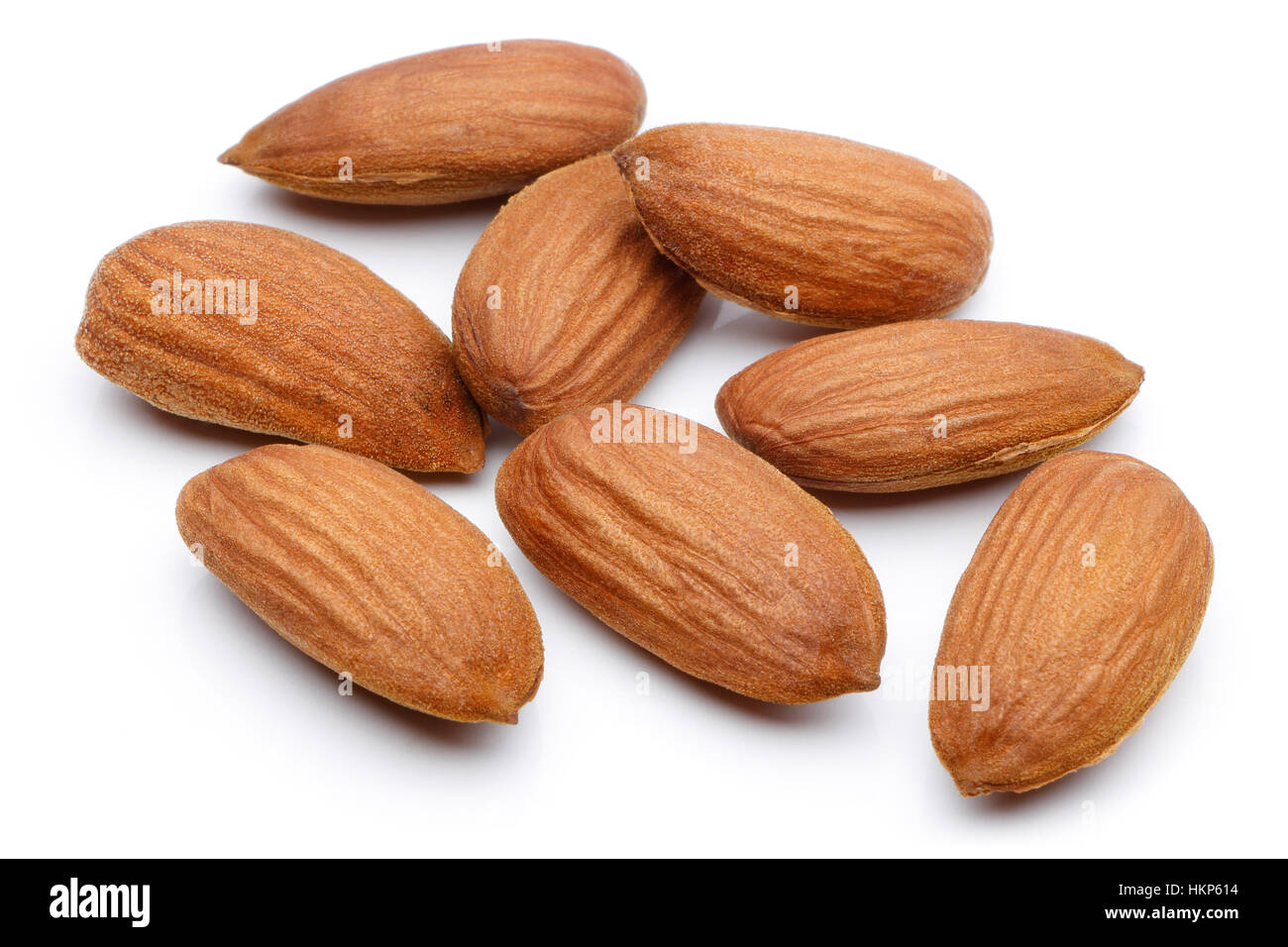 Almonds nut isolated on a white background Stock Photo - Alamy