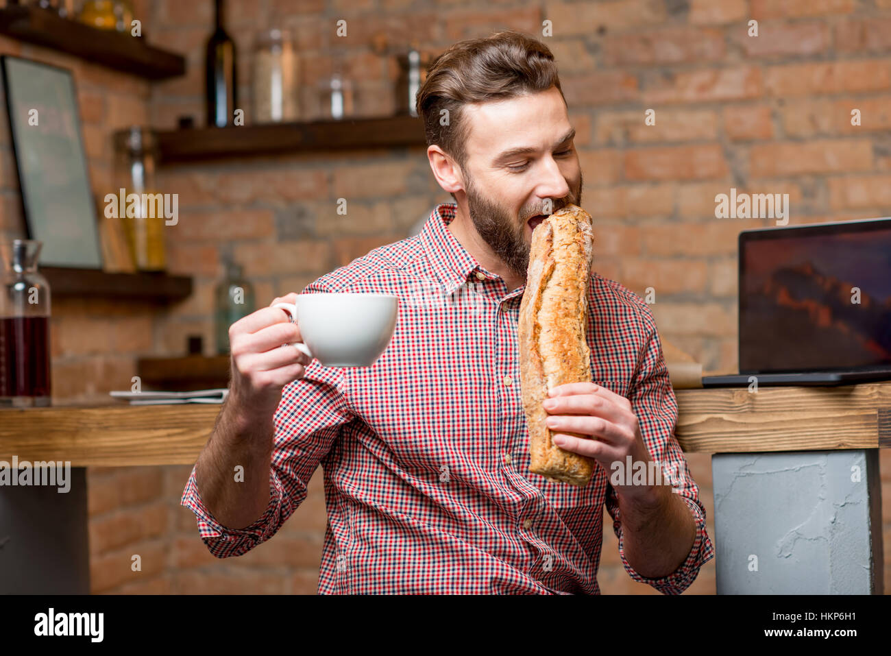 Man having breakfast Stock Photo - Alamy