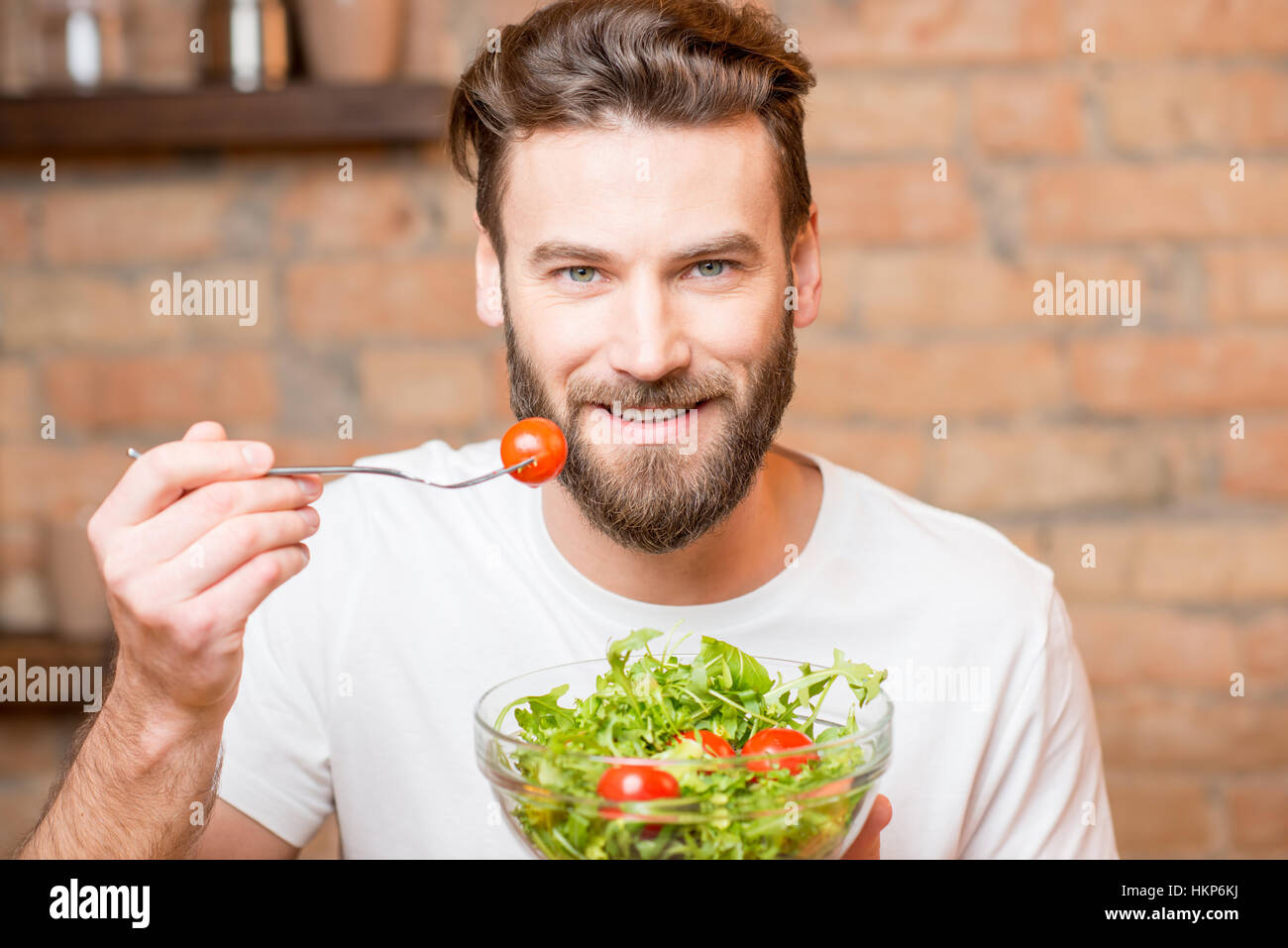 Man with salad Stock Photo - Alamy