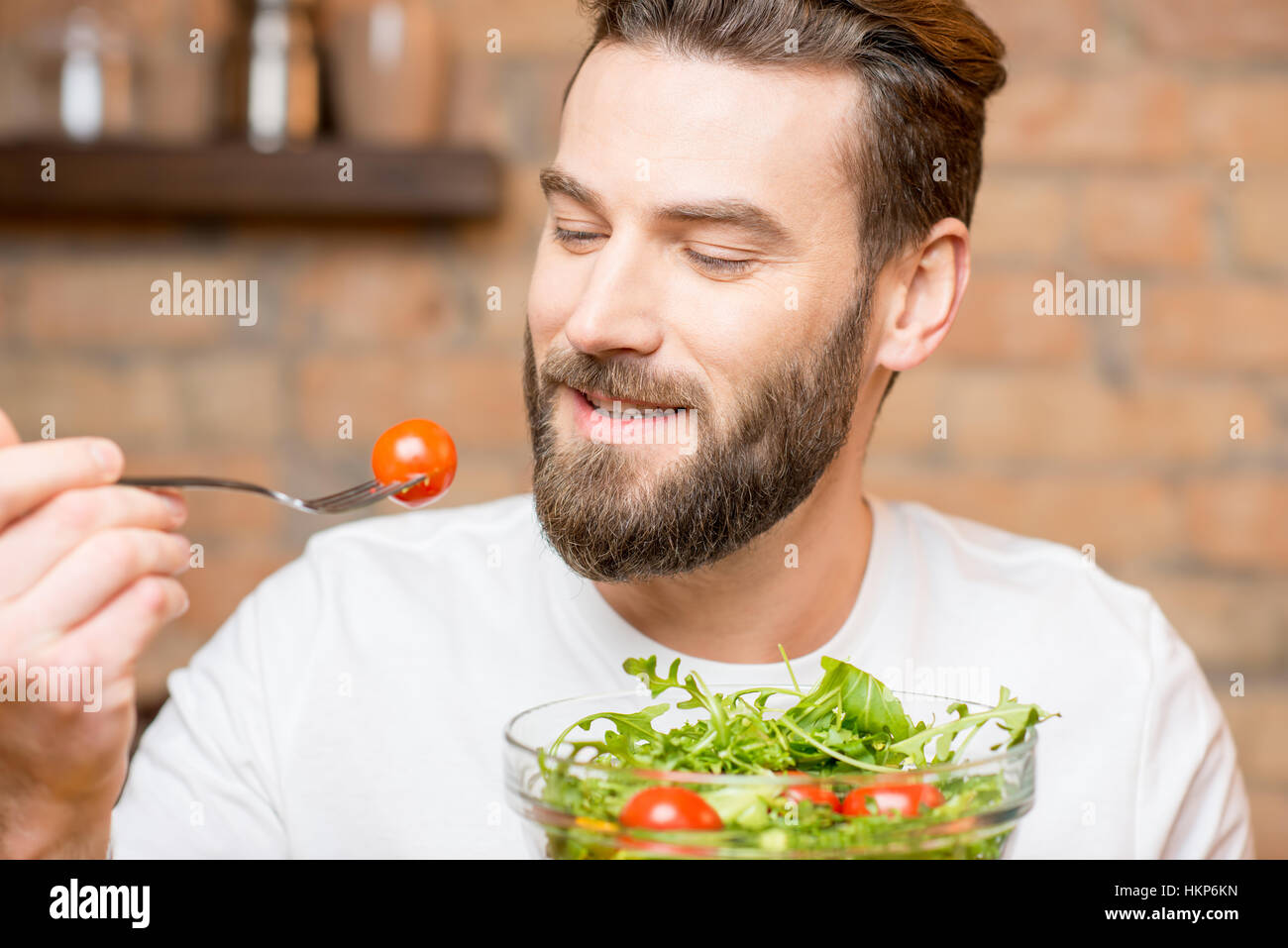 Man with salad Stock Photo - Alamy