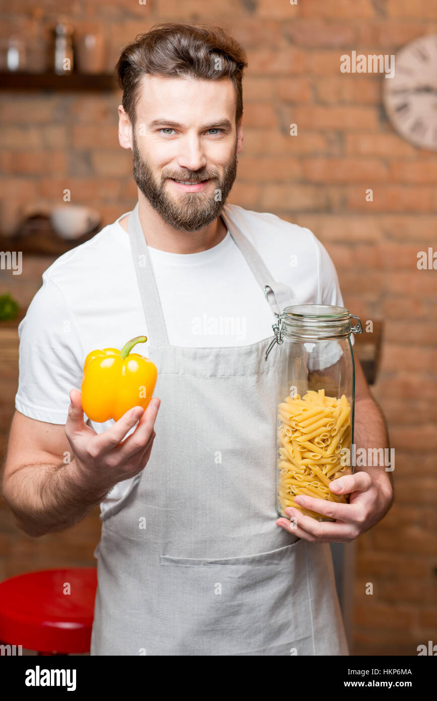 Man on the kitchen Stock Photo - Alamy