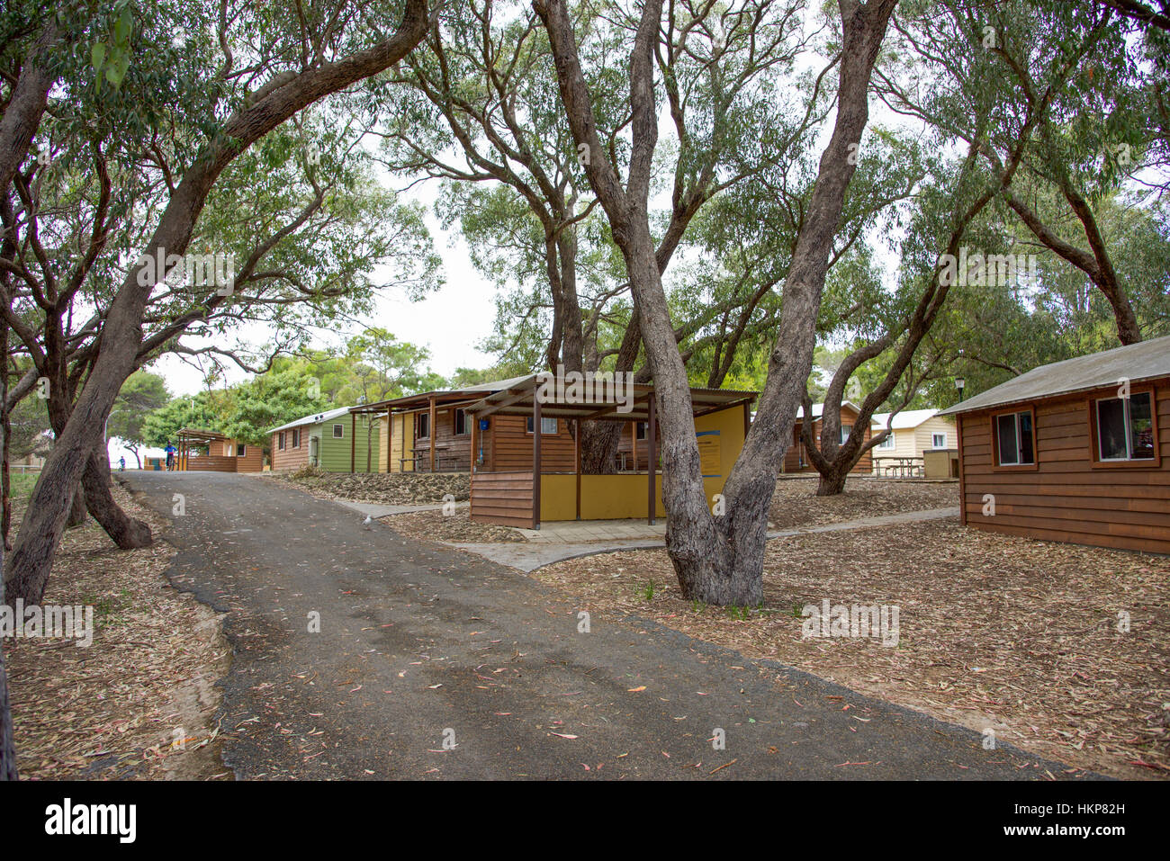 Cabins with road in treed nature campground setting at Rottnest Island ...