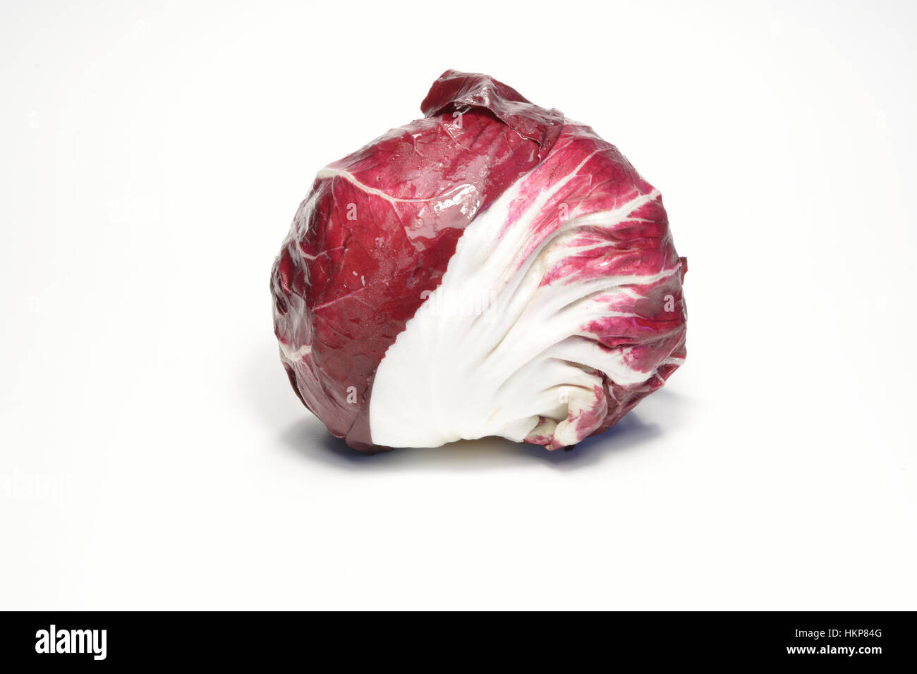 Italian red radicchio isolated on white background Stock Photo - Alamy