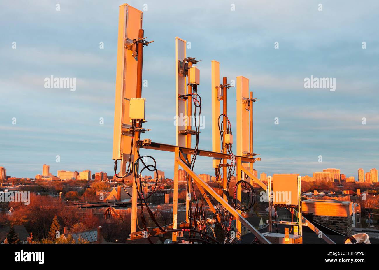 Cellular antennas in the sunset light. Seen in USA Stock Photo - Alamy