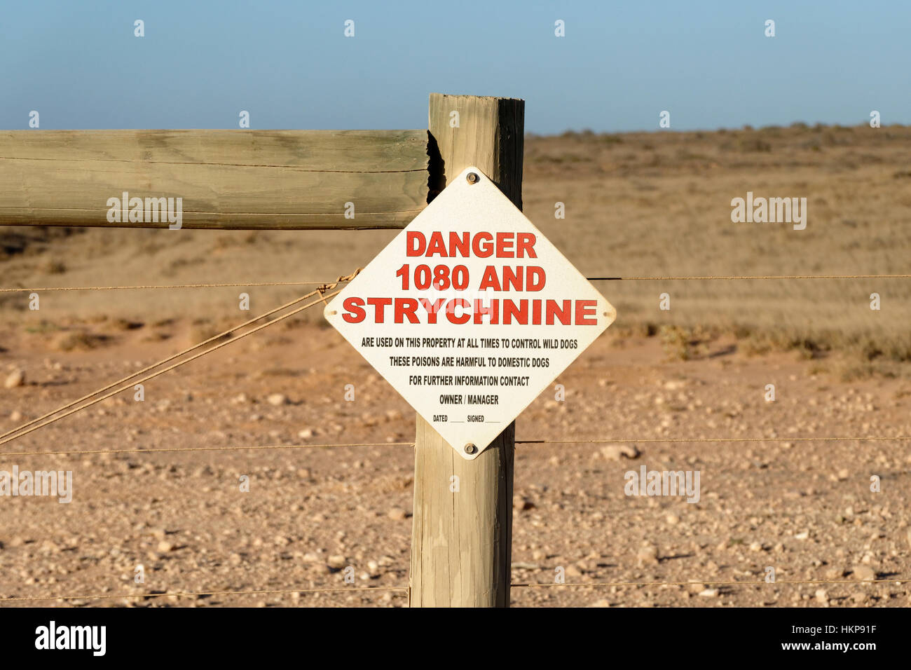 1080 Strychnine warning sign on fence post, Western Australia Stock ...