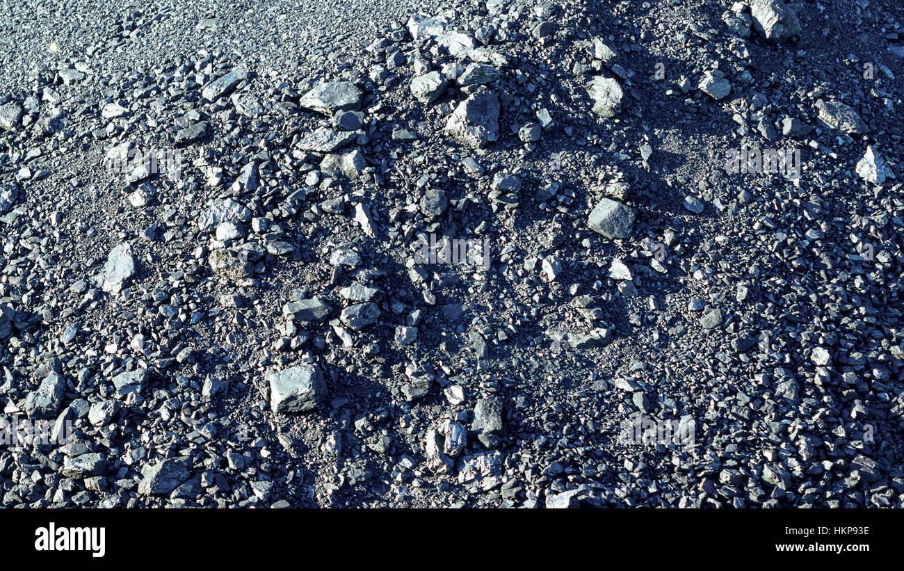 Coal texture. Anthracite surface background reflected sunbeams ...