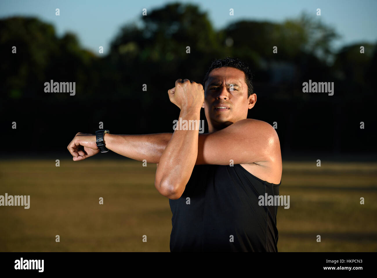 Young hispanic man stretch hi-res stock photography and images - Alamy