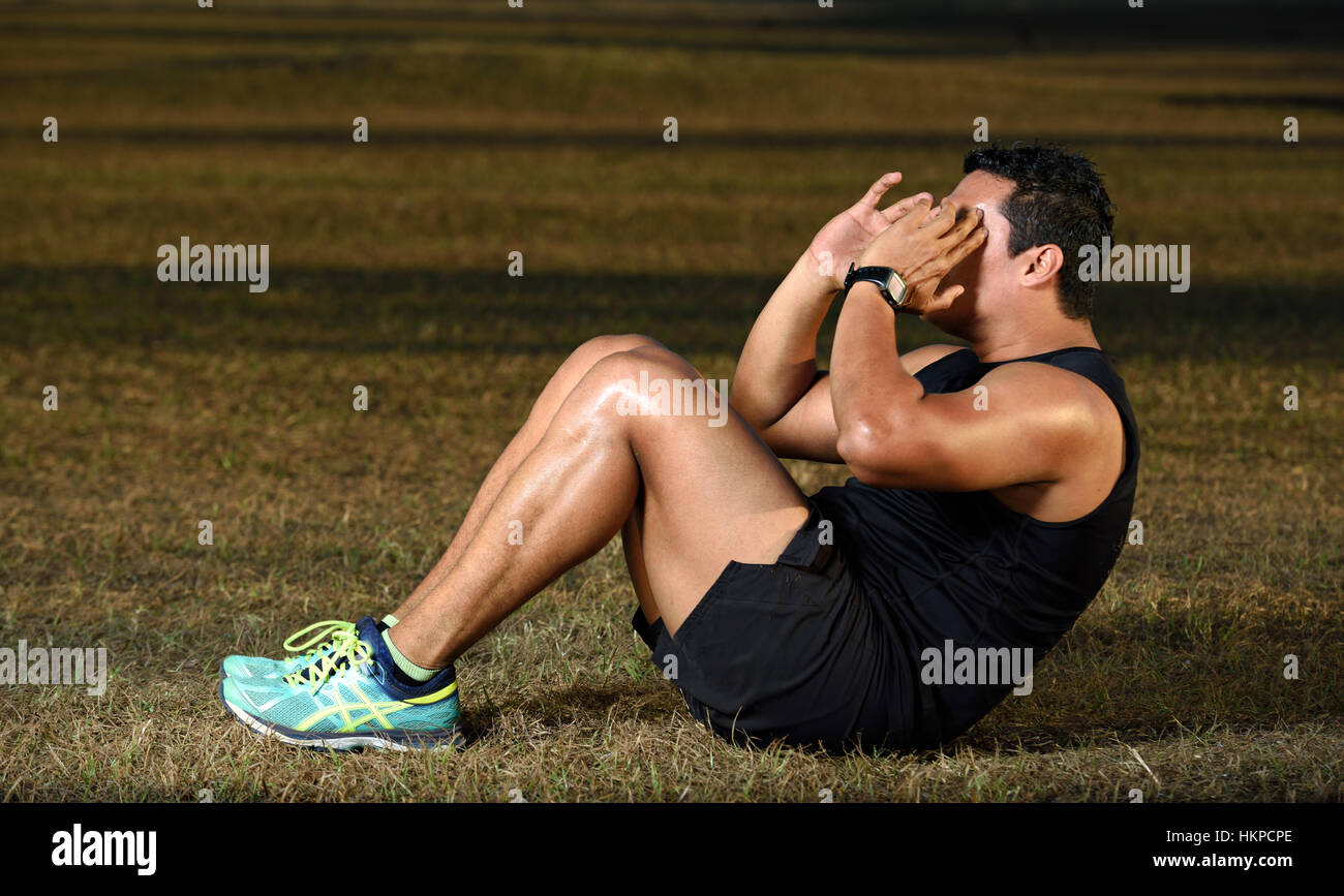 Muscle young man exercising hi-res stock photography and images - Alamy
