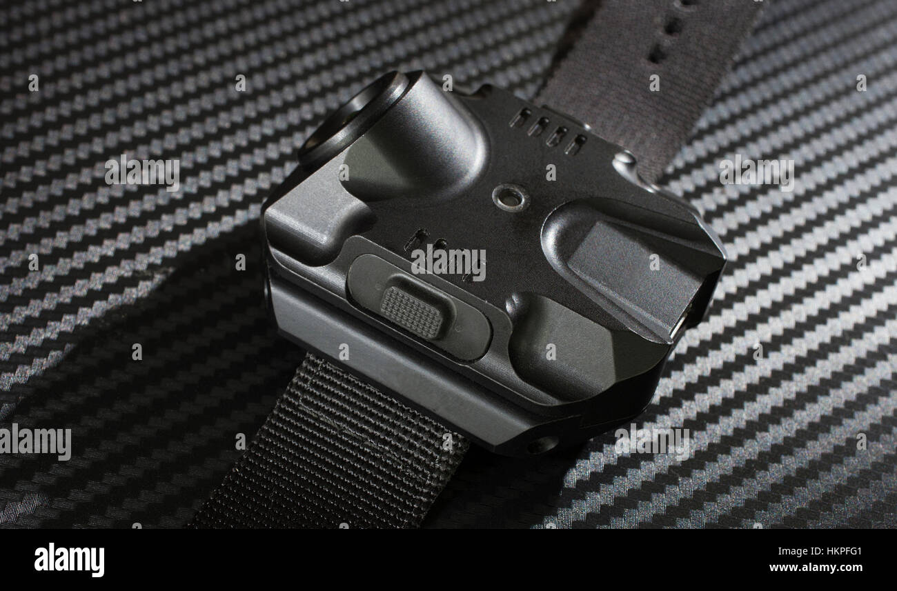 Tactical flashlight that is worn on an operators arm Stock Photo - Alamy