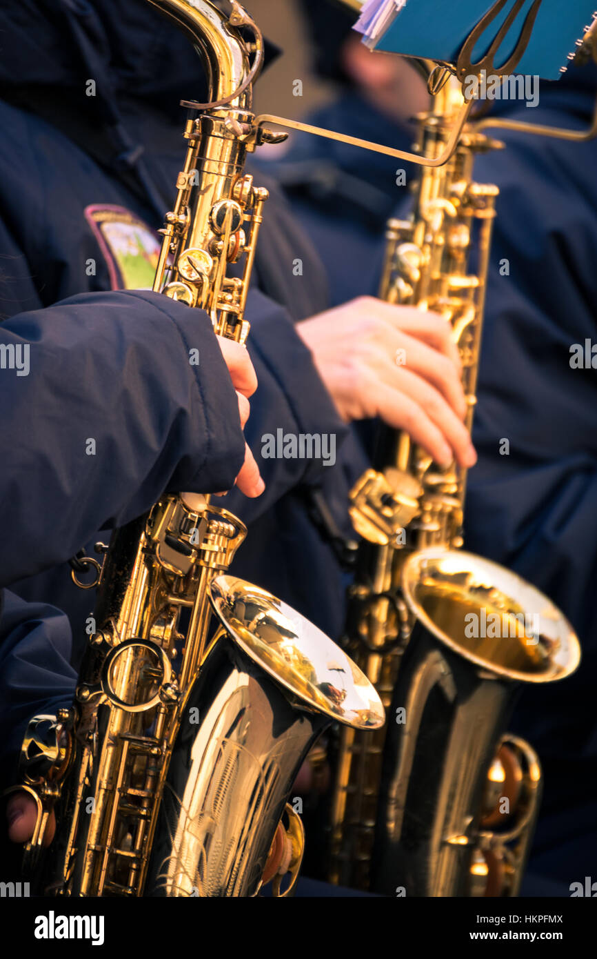Saxophones of a town band during a performance Stock Photo - Alamy