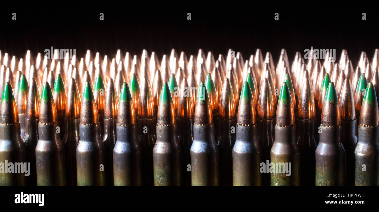 Cartridges with bullets that have a steel core some of them green Stock ...
