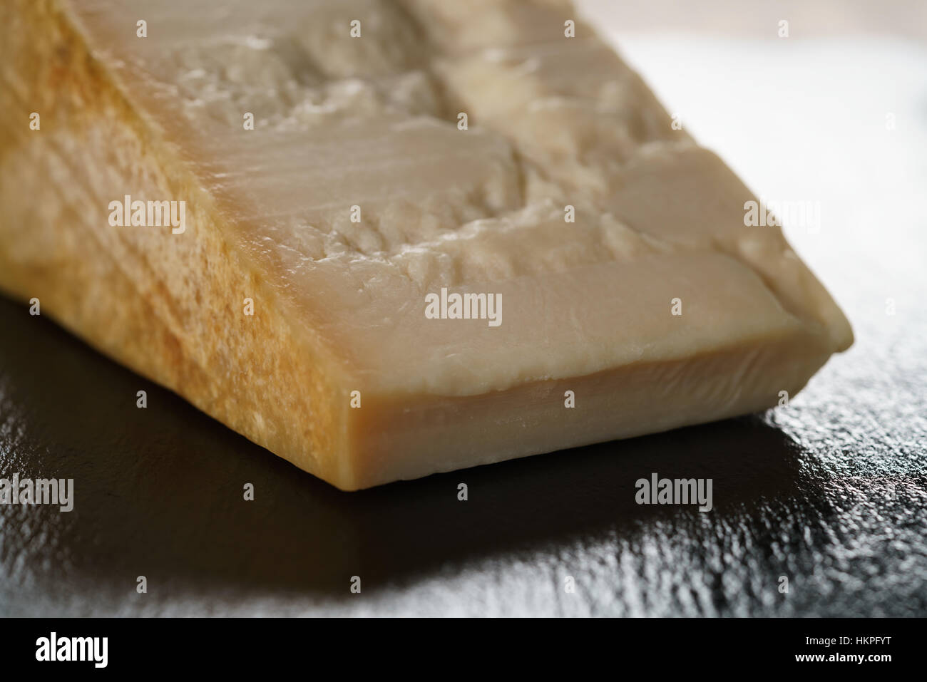 big chunk of italian parmesan cheese on slate board Stock Photo - Alamy
