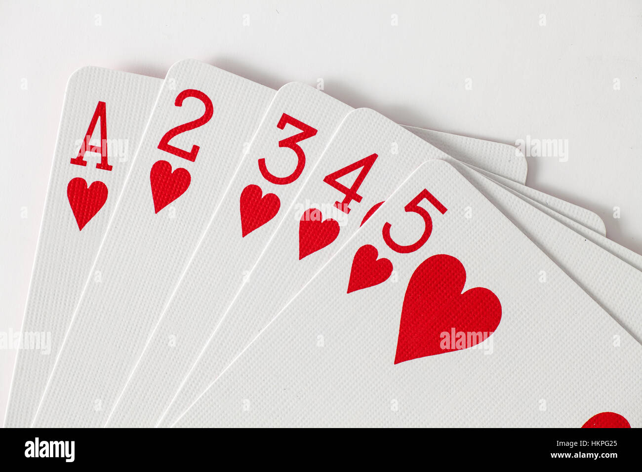 Playing Cards Low Straight Flush in Hearts Stock Photo - Alamy