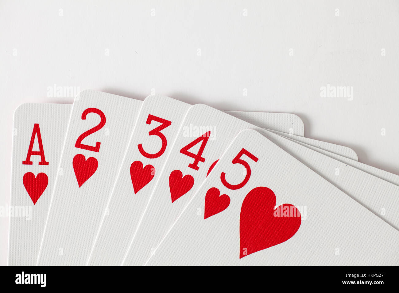 Playing Cards Low Straight Flush in Hearts Stock Photo - Alamy