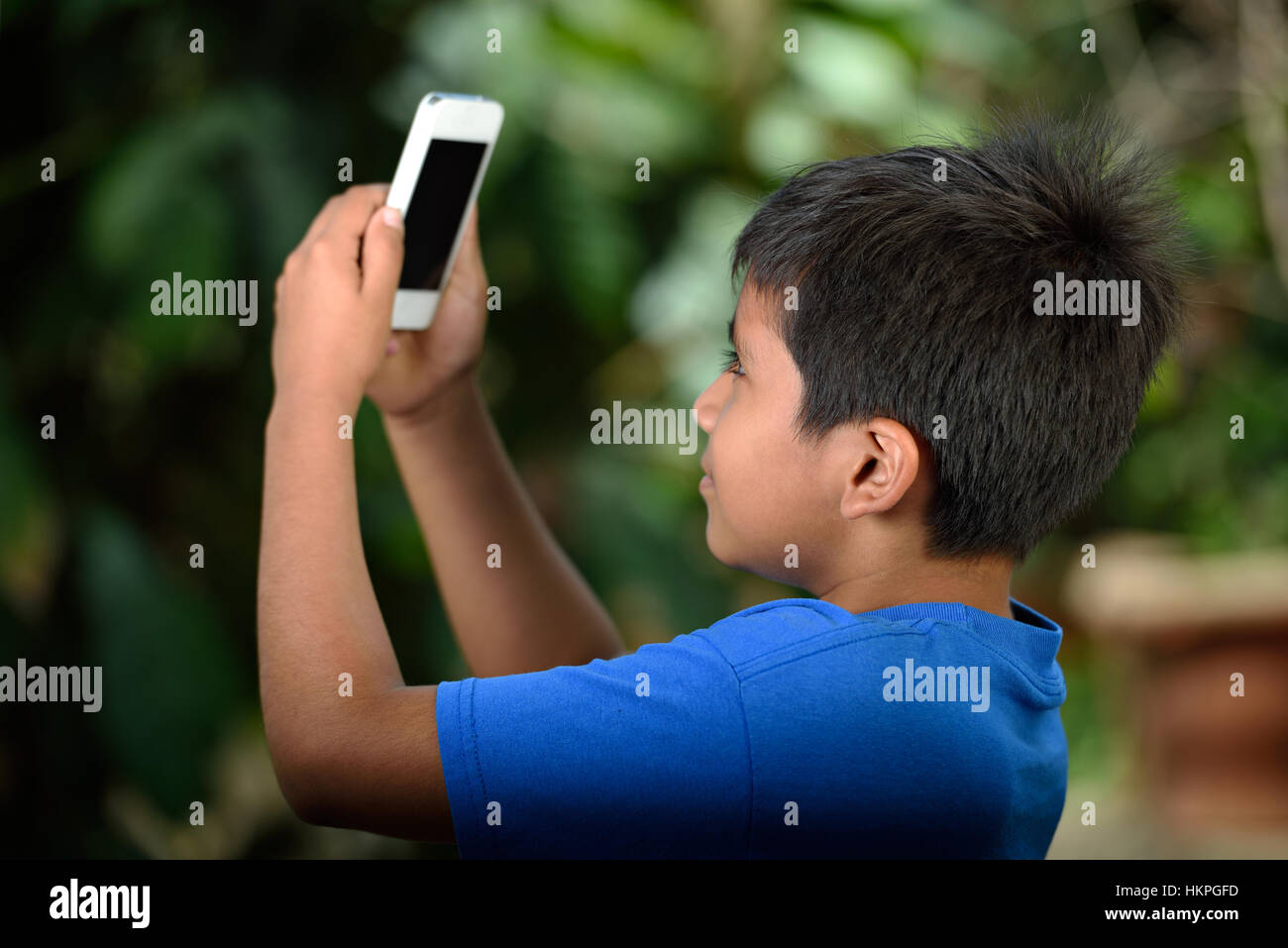 Child smartphone talk hi-res stock photography and images - Alamy