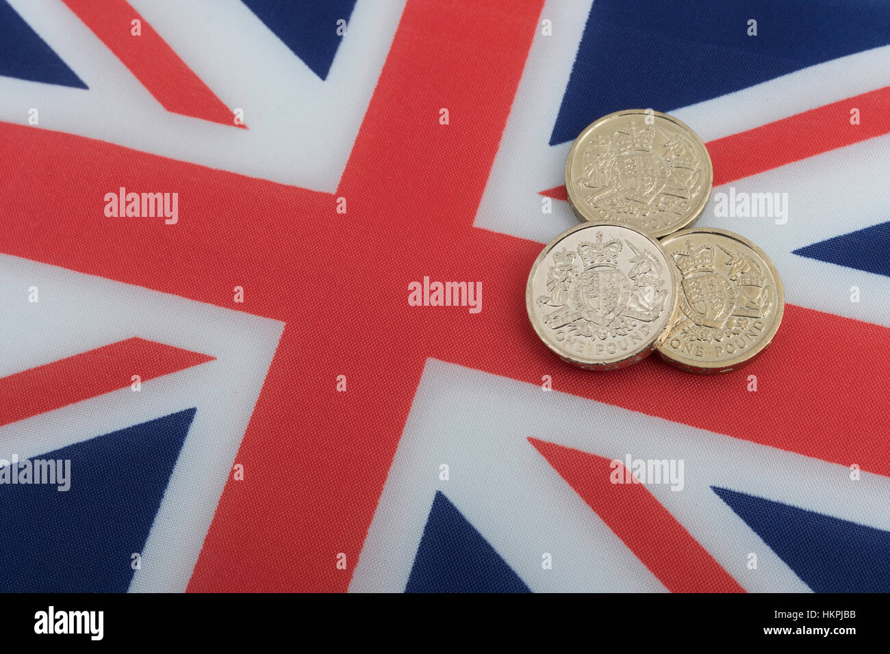 Three british pound coins hi-res stock photography and images - Alamy