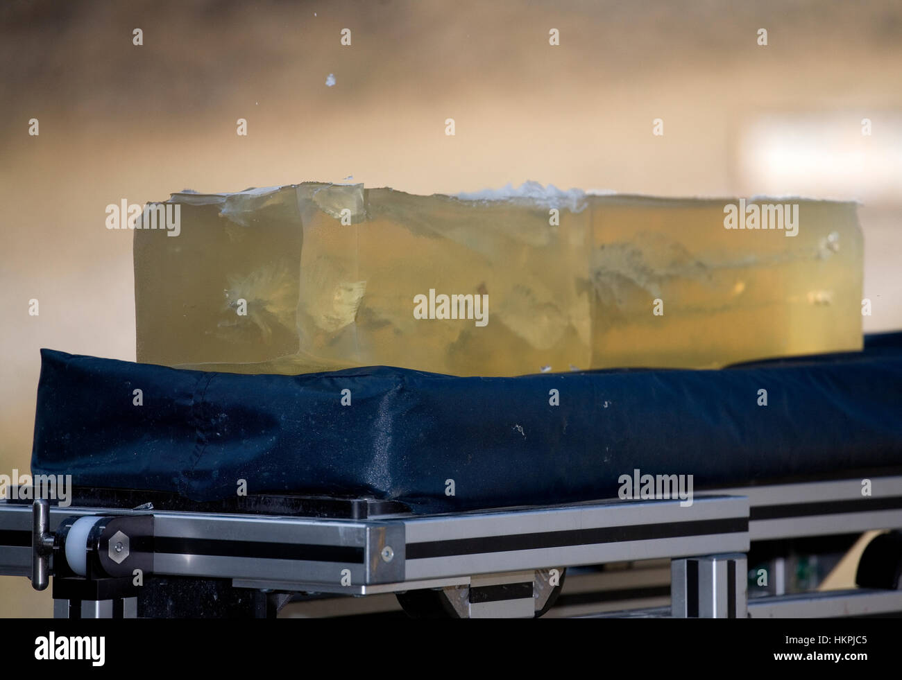 Ordnance gelatin flies as another bullet enters the mass Stock Photo ...