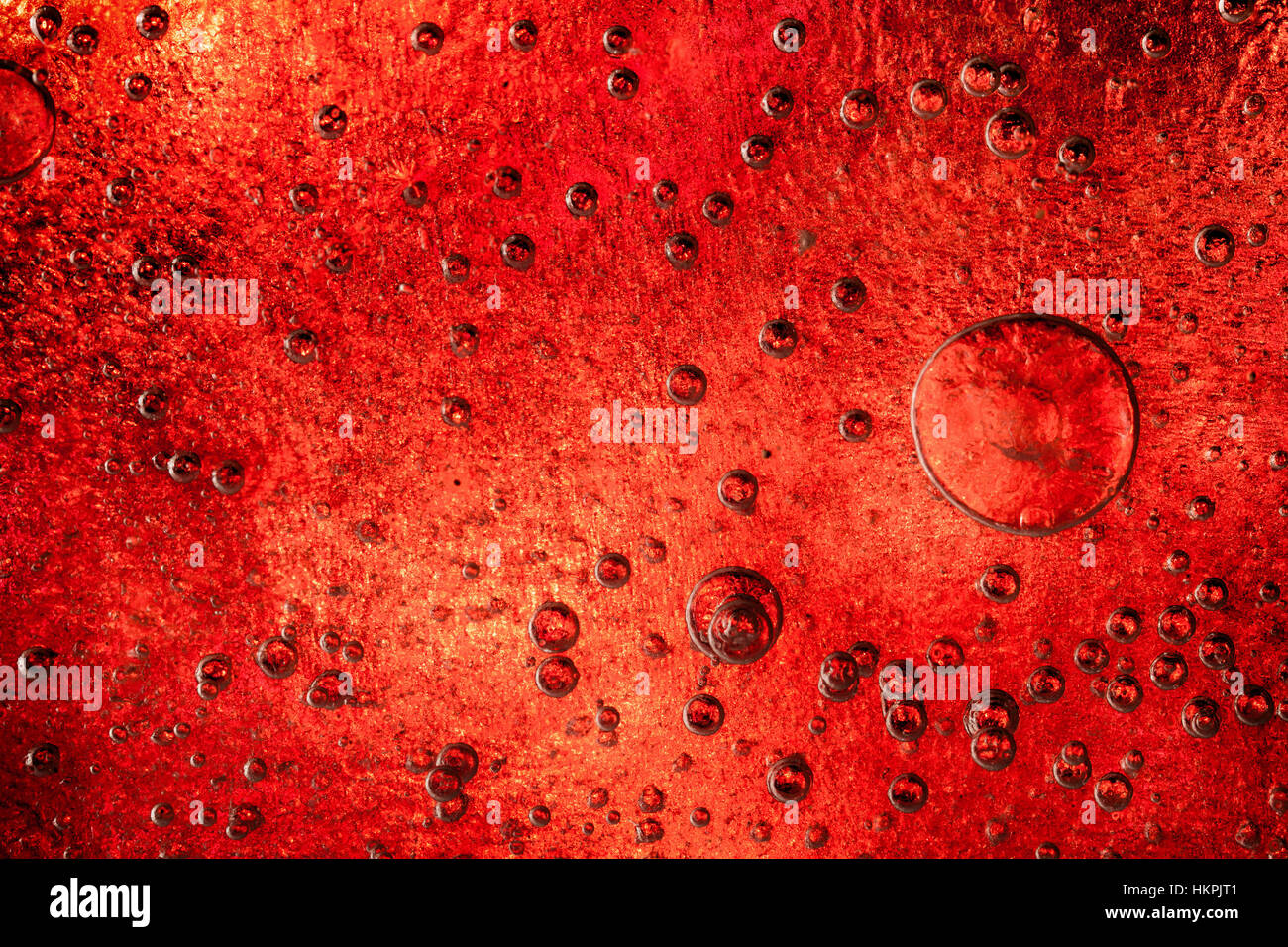 Frozen ice crystals with beautiful deep red colour below. Large and ...