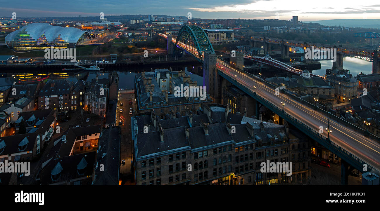 A dusk view of Newcastle upon Tyne looking across the Tyne Bridges ...
