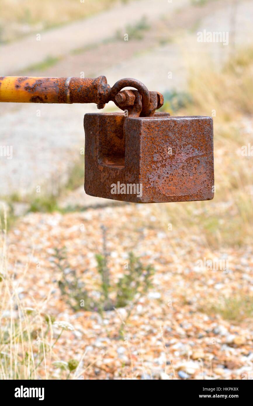 Rusty Weight and Post Stock Photo - Alamy