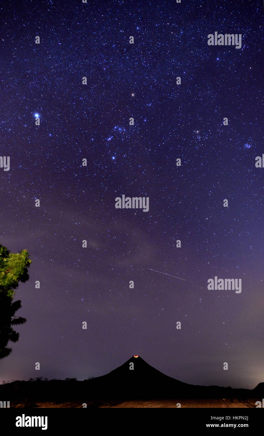 Volcano crater at night under full of stars sky Stock Photo - Alamy