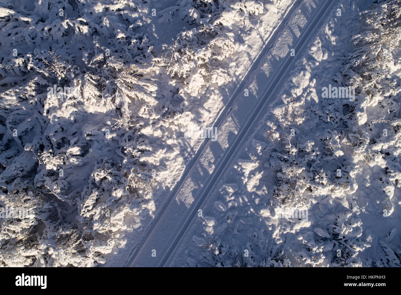 Winter road covered in snow from above Stock Photo - Alamy