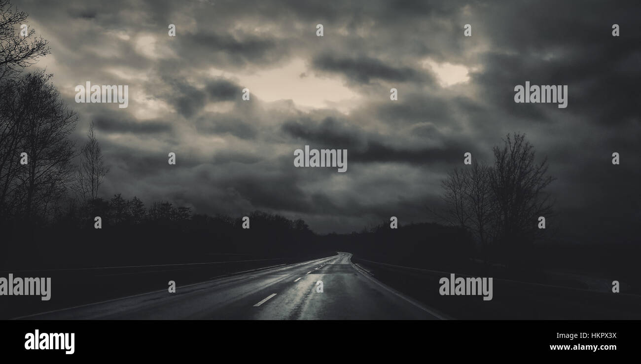 Road dark clouds hi-res stock photography and images - Alamy