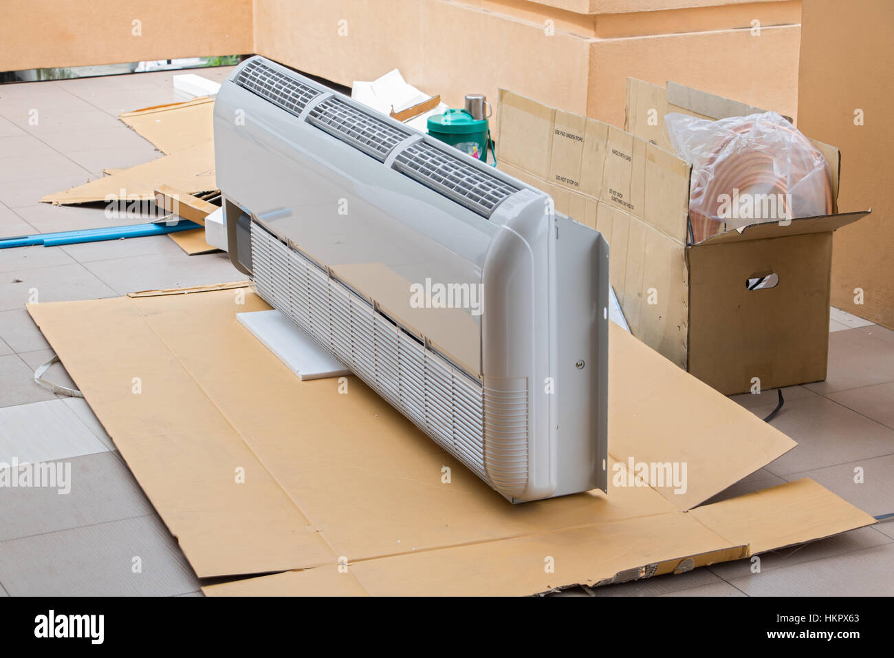 The new unwrapped air conditioning ready for installation in the ...