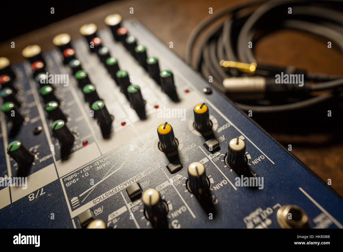 Close up shot of a mixer desk with many buttons and cables Stock Photo ...